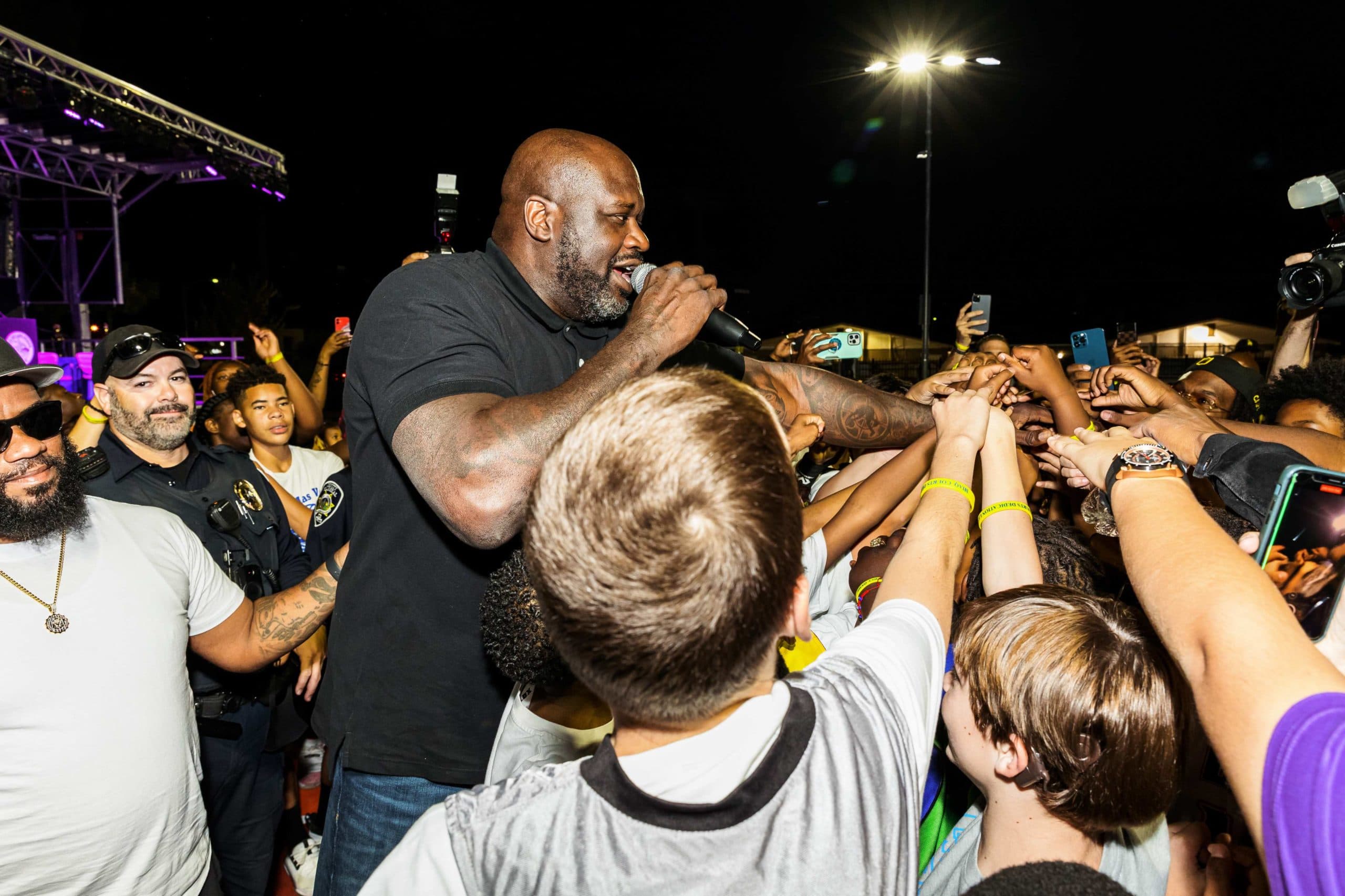 Shaq, Icy Hot and Howard Hughes deliver 100 laptops for local children ...